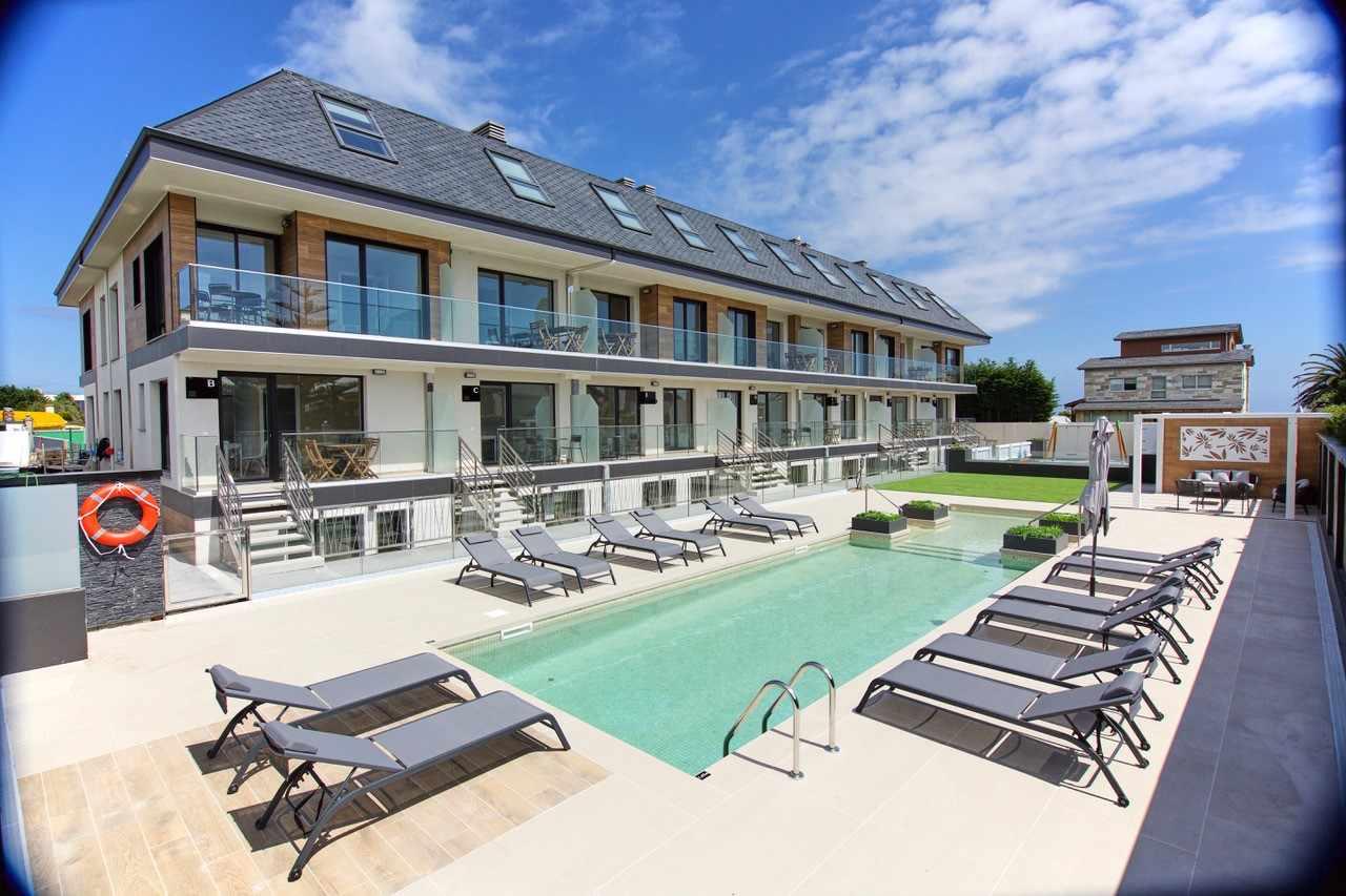 Viviendas Vacacionales ENTREPLAYAS. Foz.